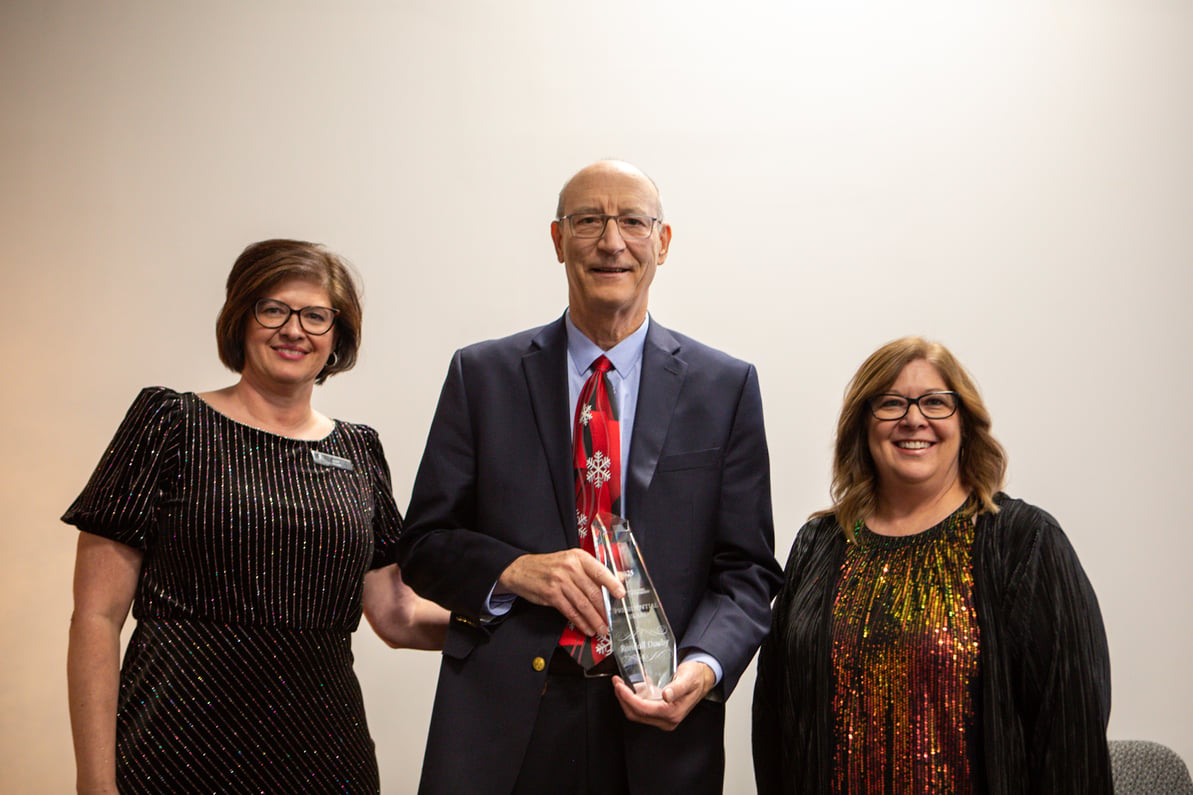 Randall Dauby (center) receives the Presidential award from RLC ...