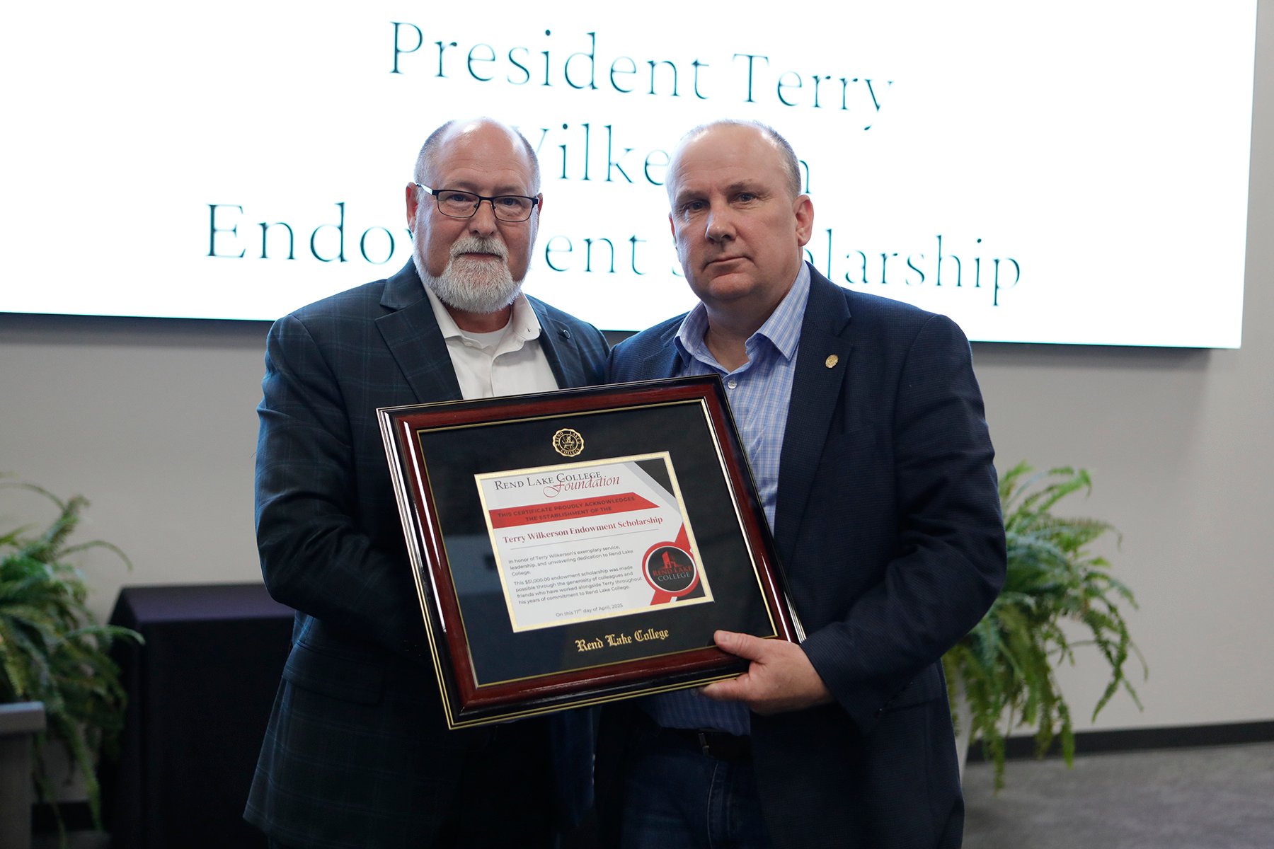 Rend Lake College President Terry Wilkerson (right) with RLC Foundation Board Chair Tony Wielt ...